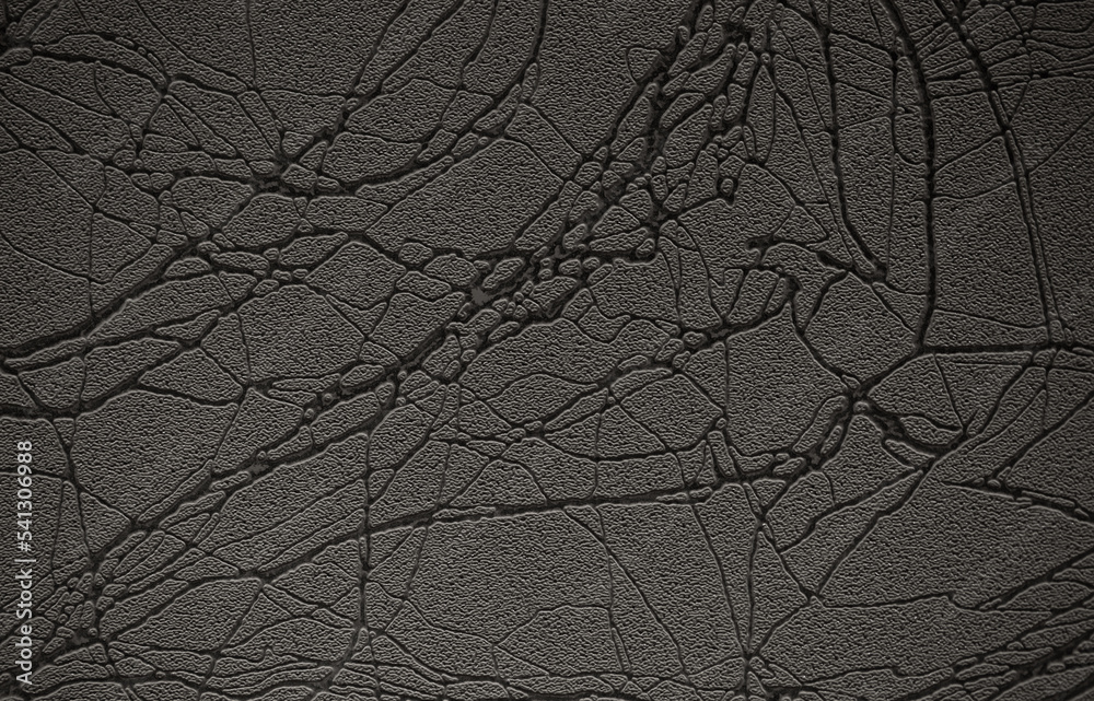 Dark background of decorative plaster with abstract spots. Unusual ...