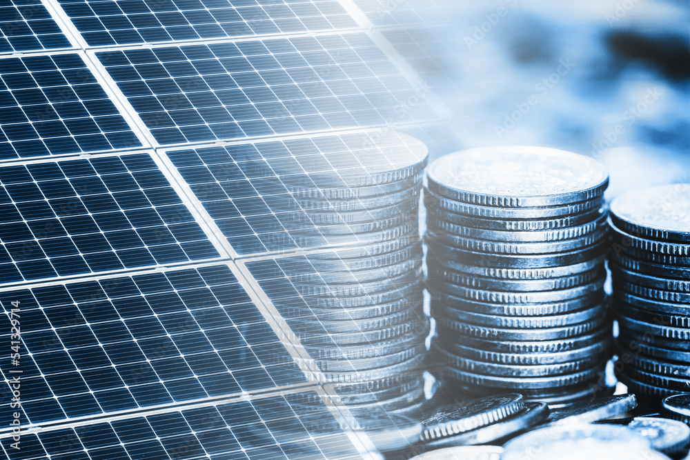 Coins stacked saving money. Solar panel texture. Environmental ...