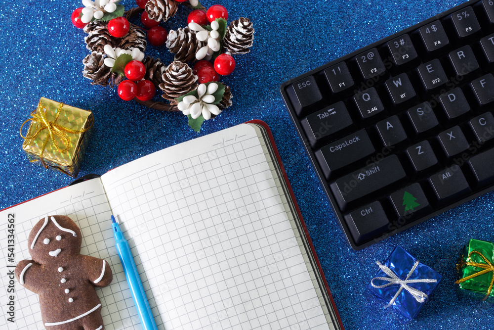 Computer keyboard, New Year and Christmas decorations, a gingerbread ...