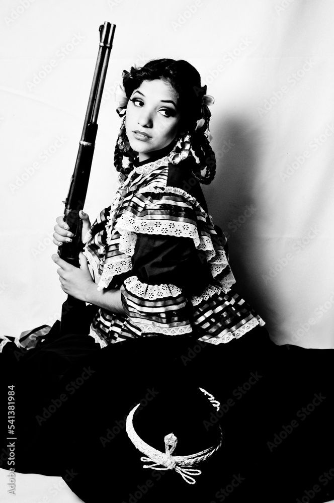 Portrait of a teen women wearing traditional Adelita costume, Mexican ...