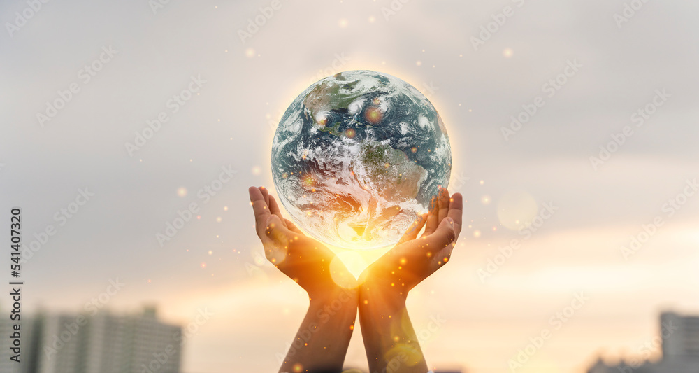 World environment day concept. Human hands holding earth global over ...