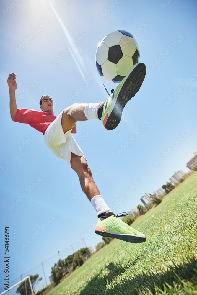 Football, fitness and soccer player training with a juggling exercise ...
