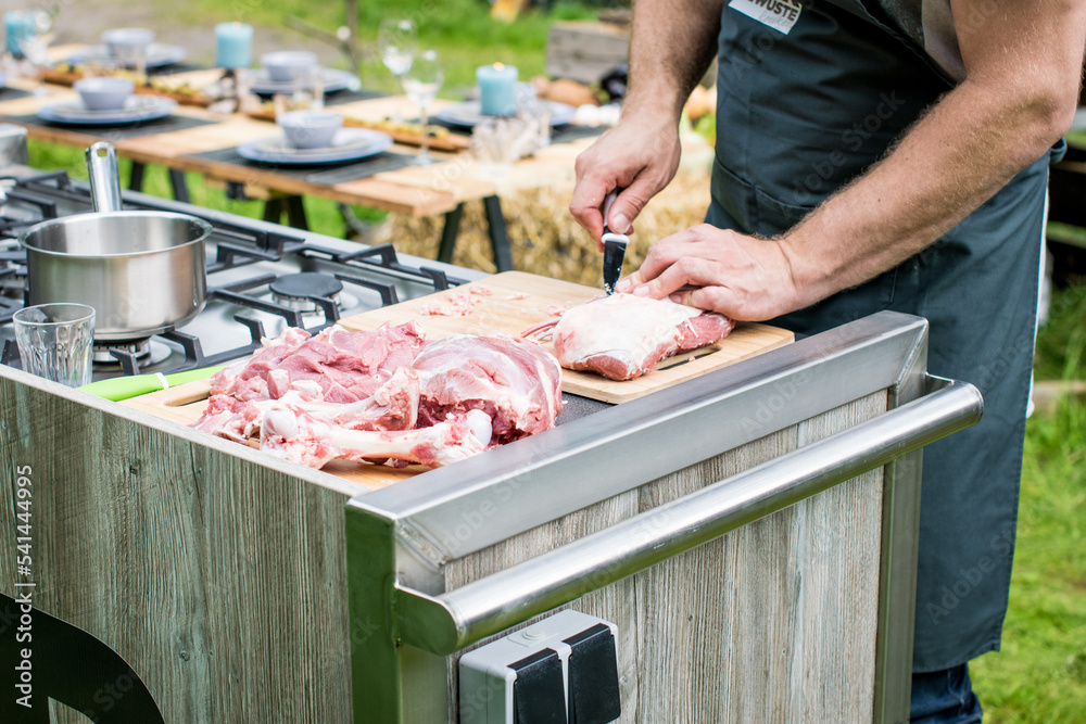 BBQ Outdoor with food preparations. People eating and dining outdoor ...