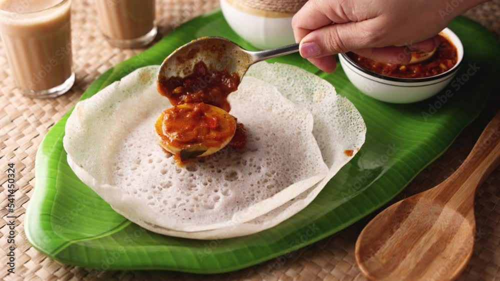 Appam rice noodles, a popular traditional steam cooked Kerala breakfast ...