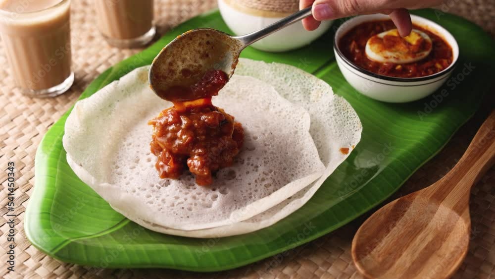 Appam rice noodles, a popular traditional steam cooked Kerala breakfast ...