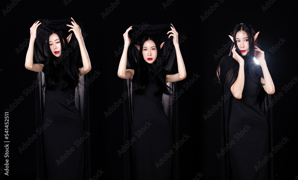 Fairy woman elf queen in black fantasy rope long dress cast spell ...