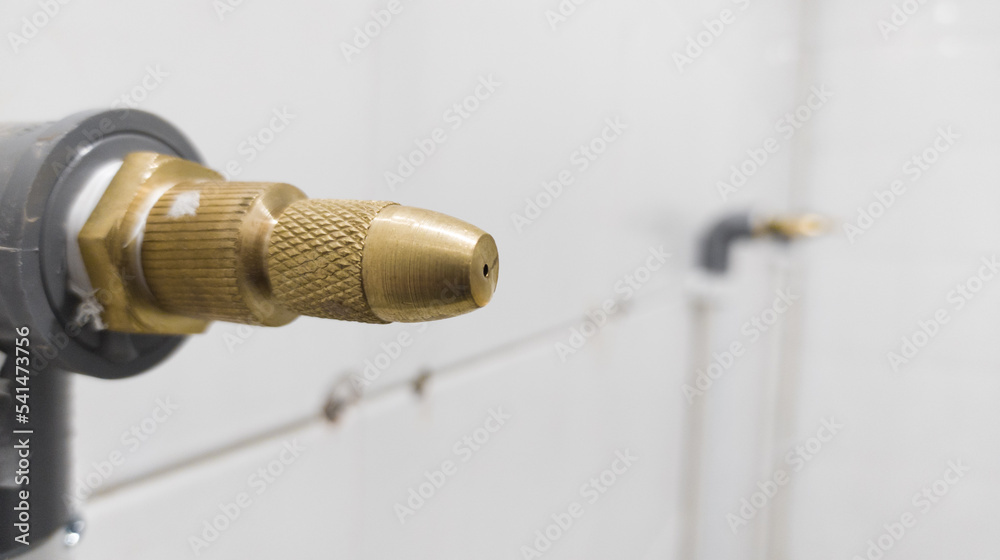 Nozle spray on the biosecurity. Stock Photo | Adobe Stock