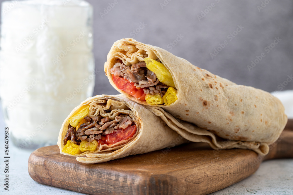 Turkish meat doner wrap on gray background. Traditional flavors. Doner ...