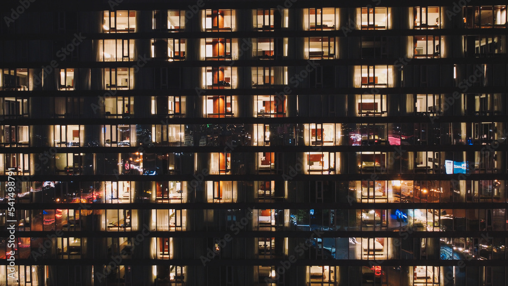 Night office windows view. Lights inside the night office windows Stock ...