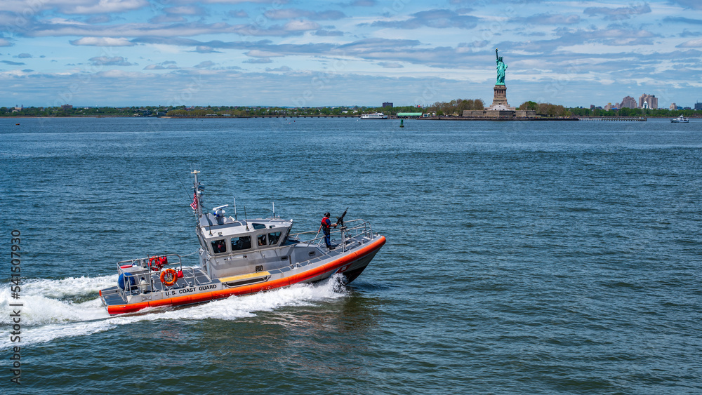 U.S. Coast Guard Response Boat - Medium and Statue of Liberty Stock ...