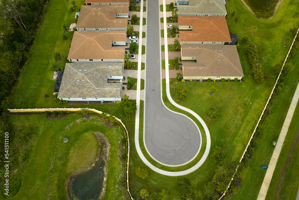 Aerial view of cul-de-sac at neighborhood street dead end with tightly ...