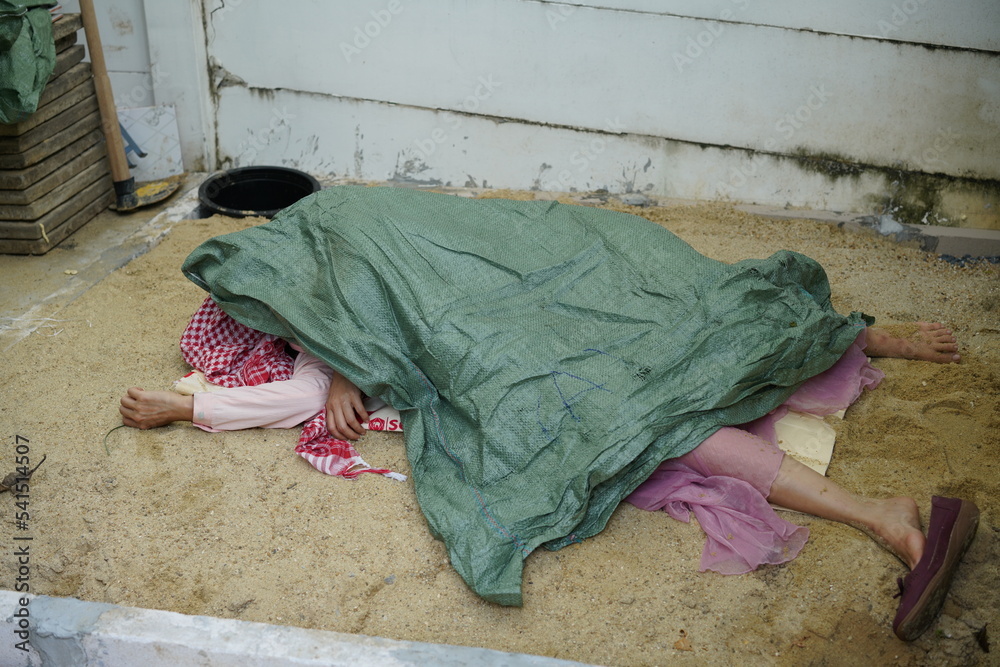 Dead woman lay down under bag covered death body from accident or ...