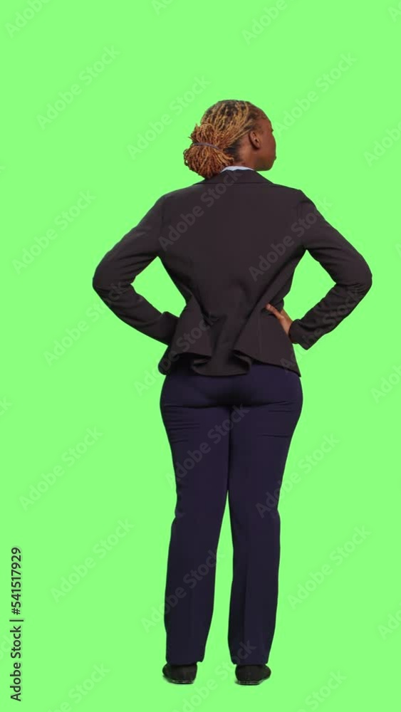 Vertical video: Female office worker with suit waiting in line on ...