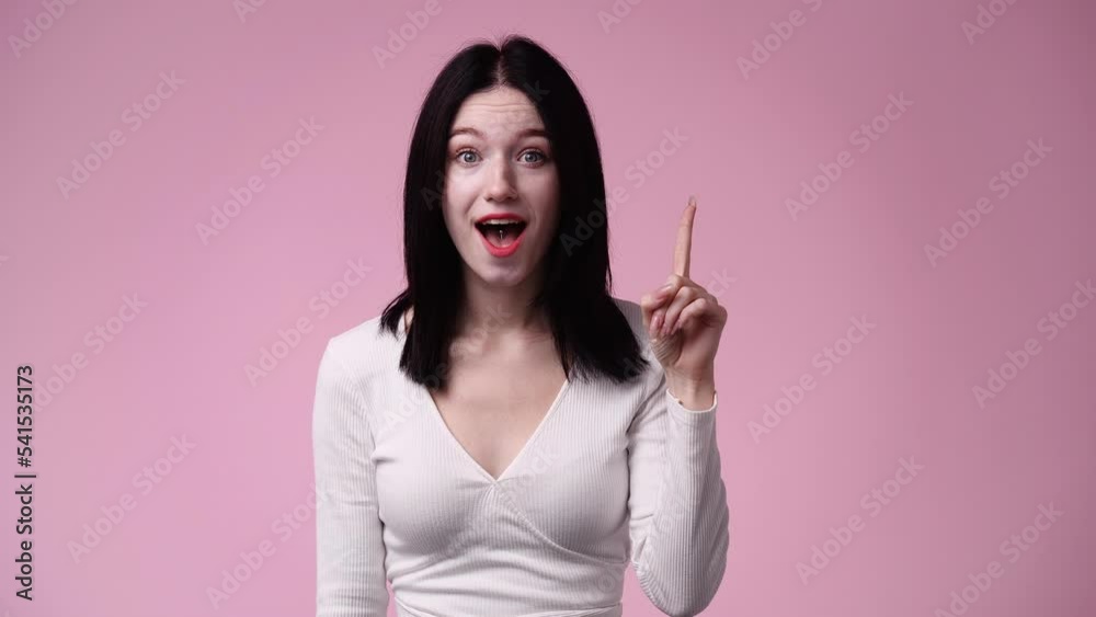 4k video of young woman thinking over pink background.. Stock Video ...