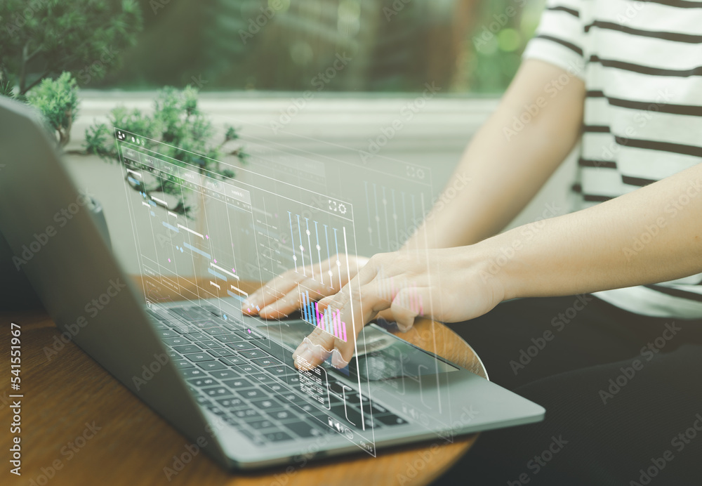 Analyst working on laptop computer. Business Analytics chart and Data ...