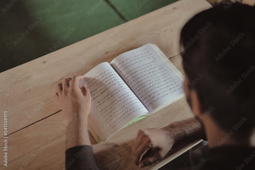 Young Muslim Men Reciting Quran Stock 写真 | Adobe Stock