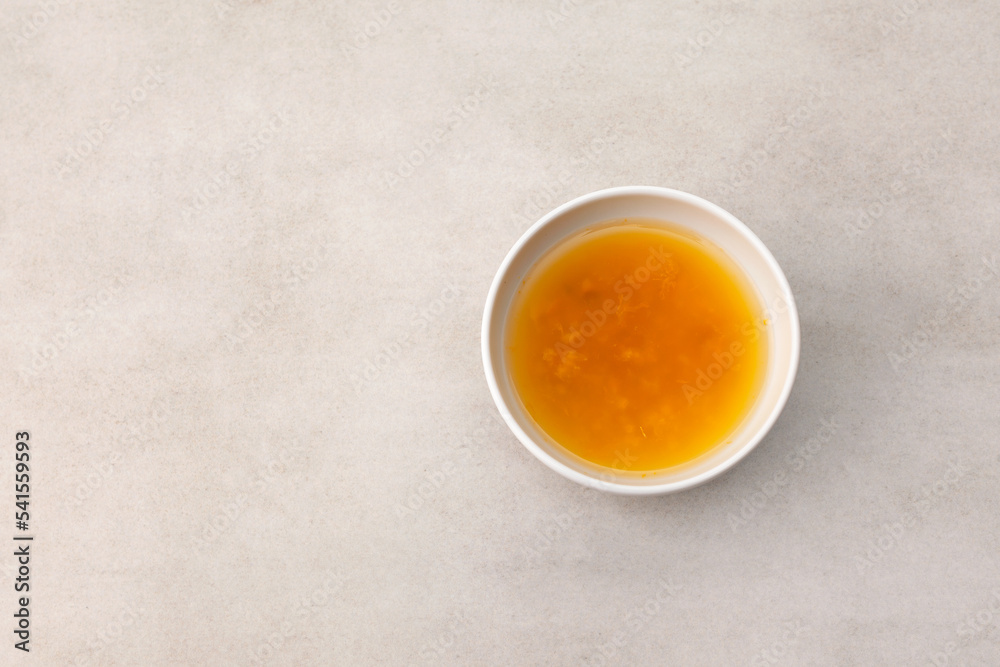 Yuzu tea or Yuja cha on stone table, top view. Popular Korean tea ...