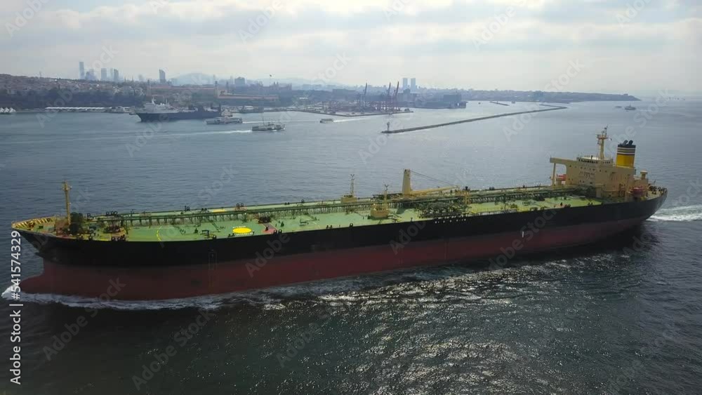 Aerial of an Oil products tanker underway against Istanbul Docks. Some ...