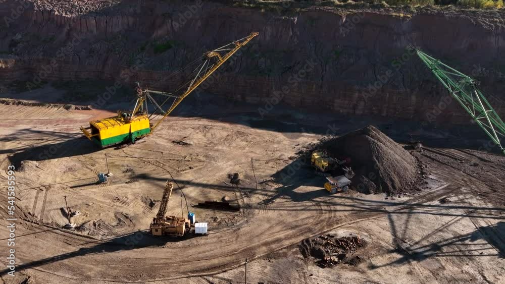 Mining excavator load dolomite minerals in haul truck. Limestone mining ...