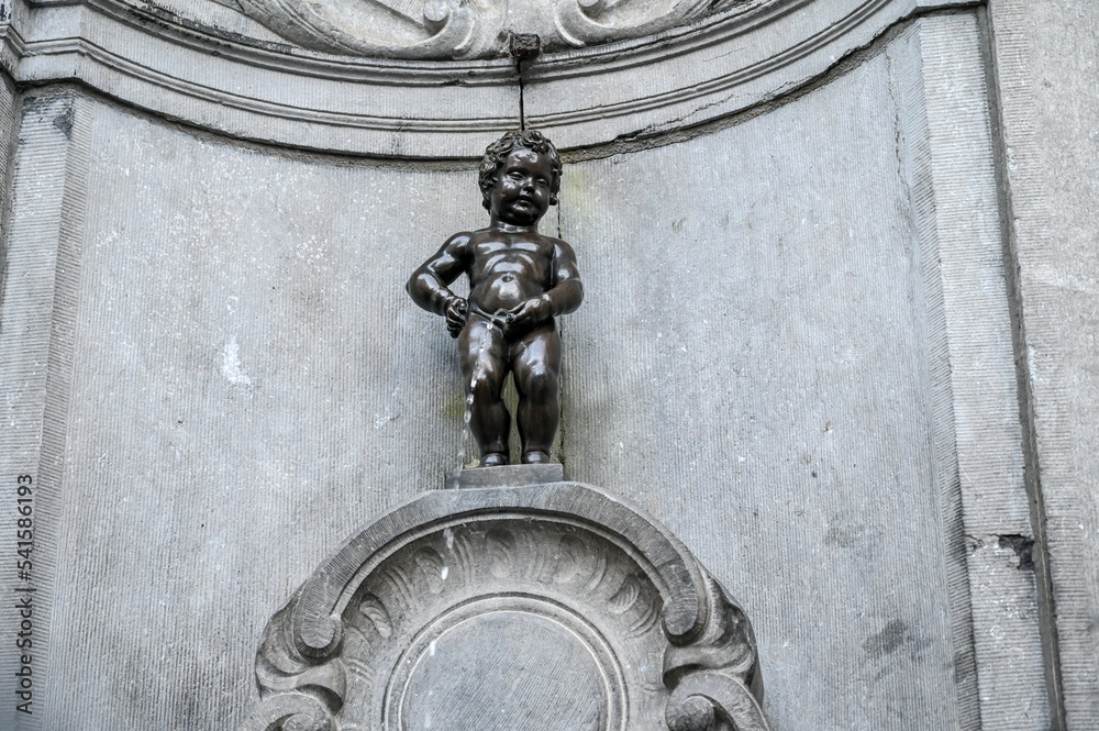 Maneken Pis, symbol of Brussels, Belgium. Famous landmark, bronze ...
