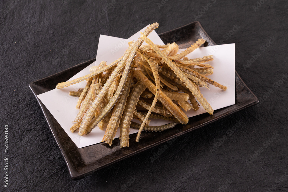うなぎボーンせんべい Fried eel bone Stock Photo | Adobe Stock