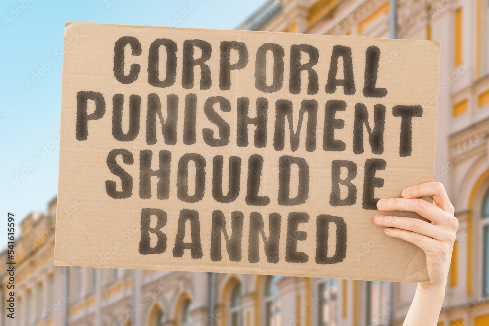 The Phrase Corporal Punishment Should Be Banned Is On A Banner In