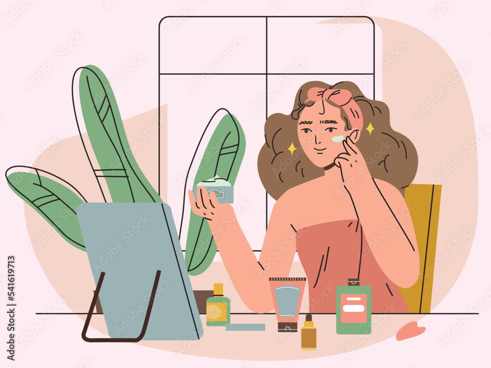 Skincare routine. Happy cute young woman applying face cream. Self care ...