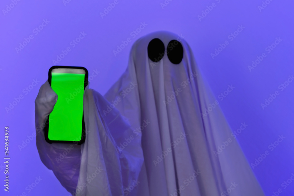 The ghost shows a phone with a green screen. Phone with chromakey. The ...