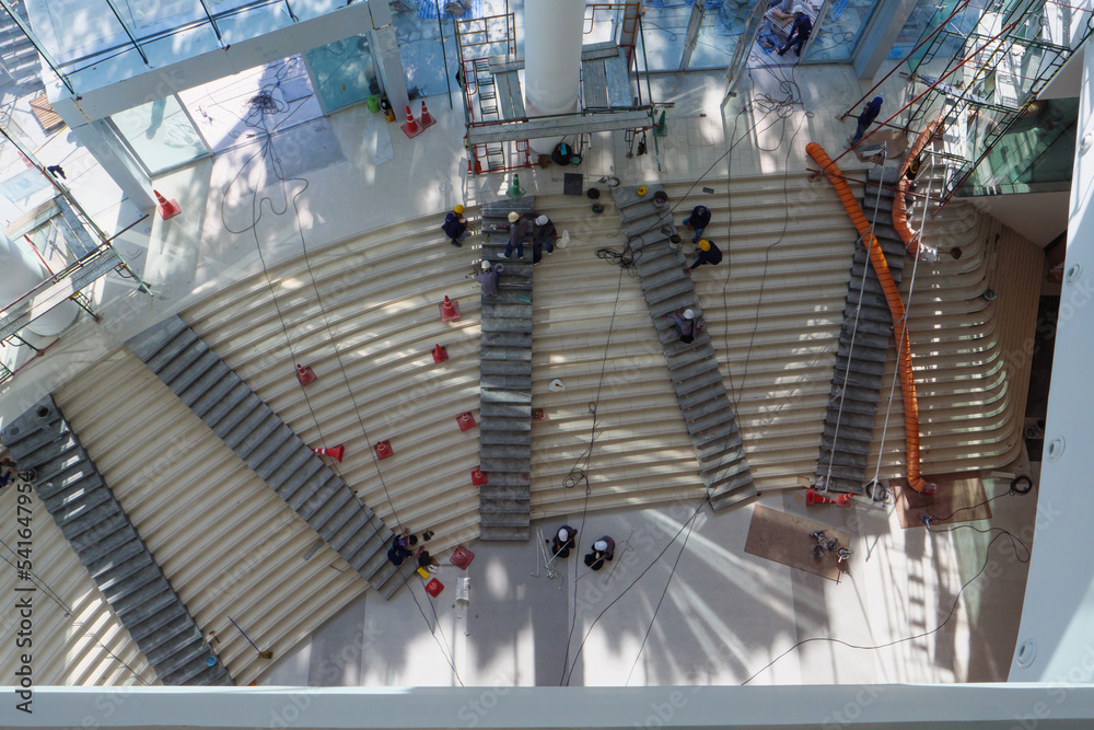 Bangkok, Thailand - September 04, 2022: Workers install granite ladder ...