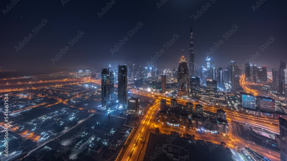 Aerial panorama of tallest towers in Dubai Downtown skyline and highway ...