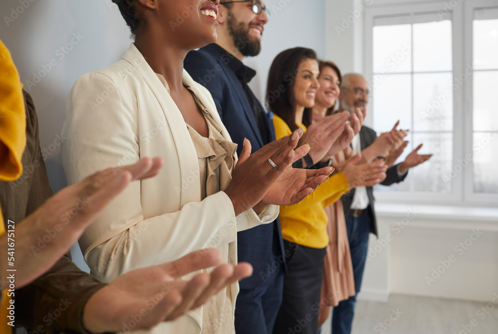 Close up of diverse multiracial businesspeople clap hands meet welcome ...