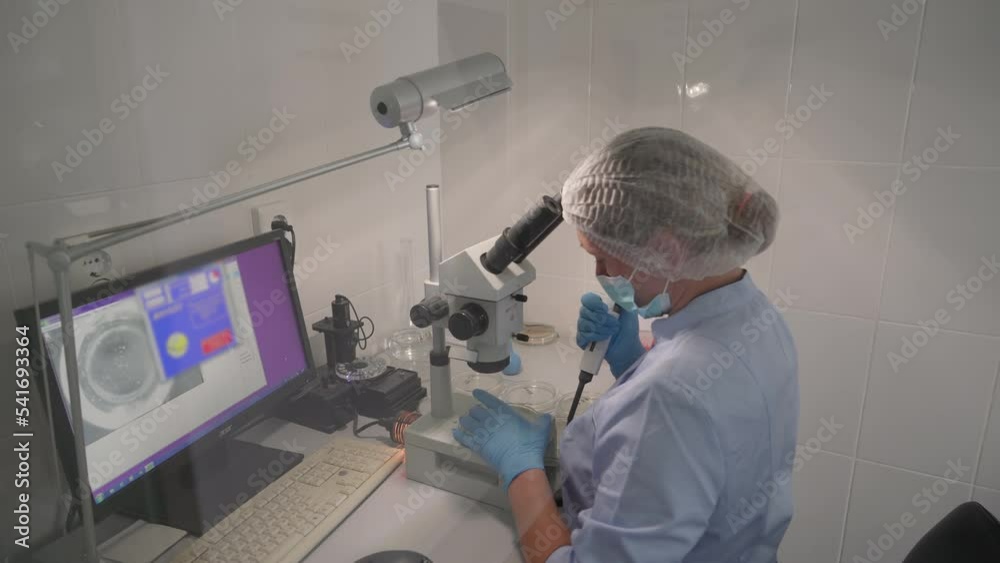 Laboratory Specialist Tests Product Quality By Pouring Liquid Sample ... Laboratory Specialist Tests Product Quality By Pouring Liquid Sample ...
