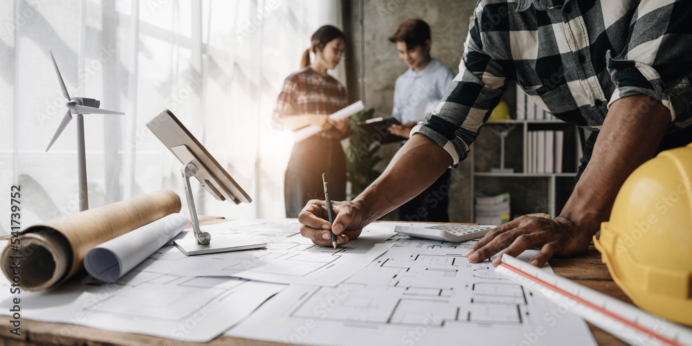 Civil engineer teams meeting working together wear worker helmets ...