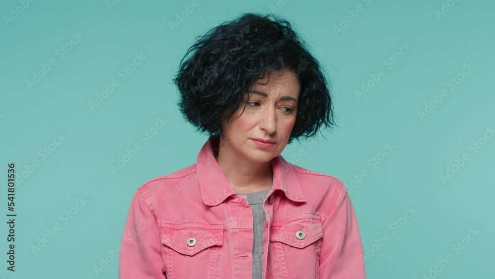 Fun confused shy shamed mature woman 40s with shortcut in pink denim ...