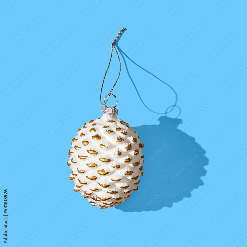 Cone christmas ball on blue pastel background Stock Photo | Adobe Stock