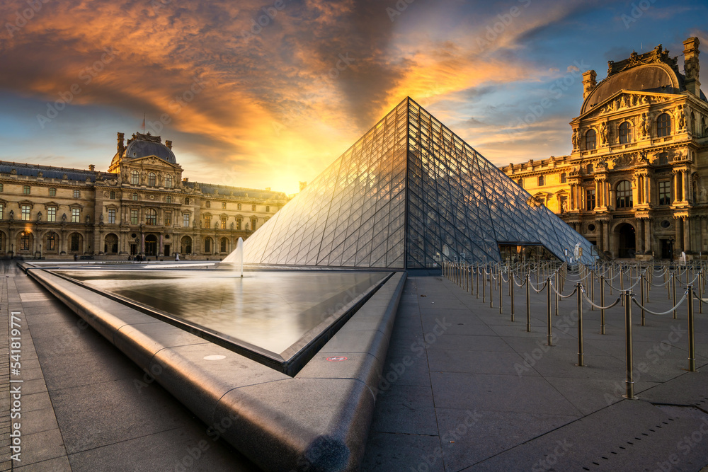 Paris Louvre Museum at sunrise. Home to Leonardo da Vinci's Mona Lisa ...