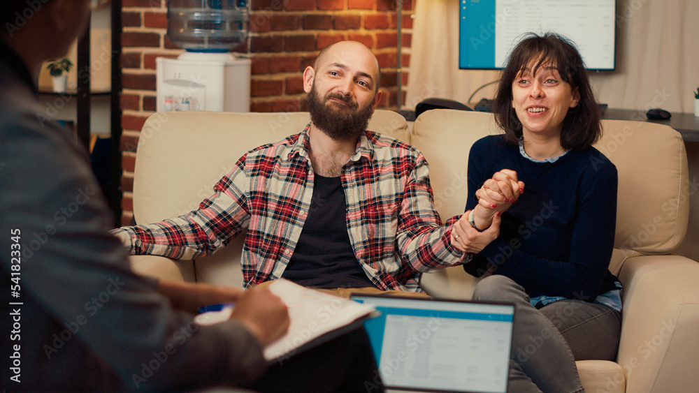 Man and woman holding hands after making peace, enjoying reconciliation ...