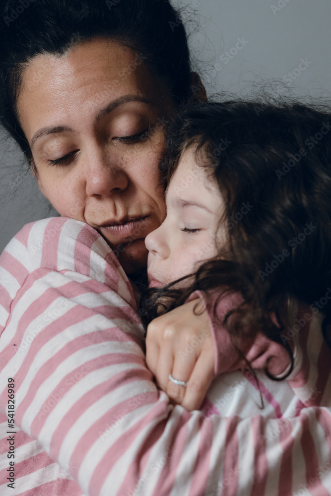 upset little girl being consoled by mom Stock Photo | Adobe Stock