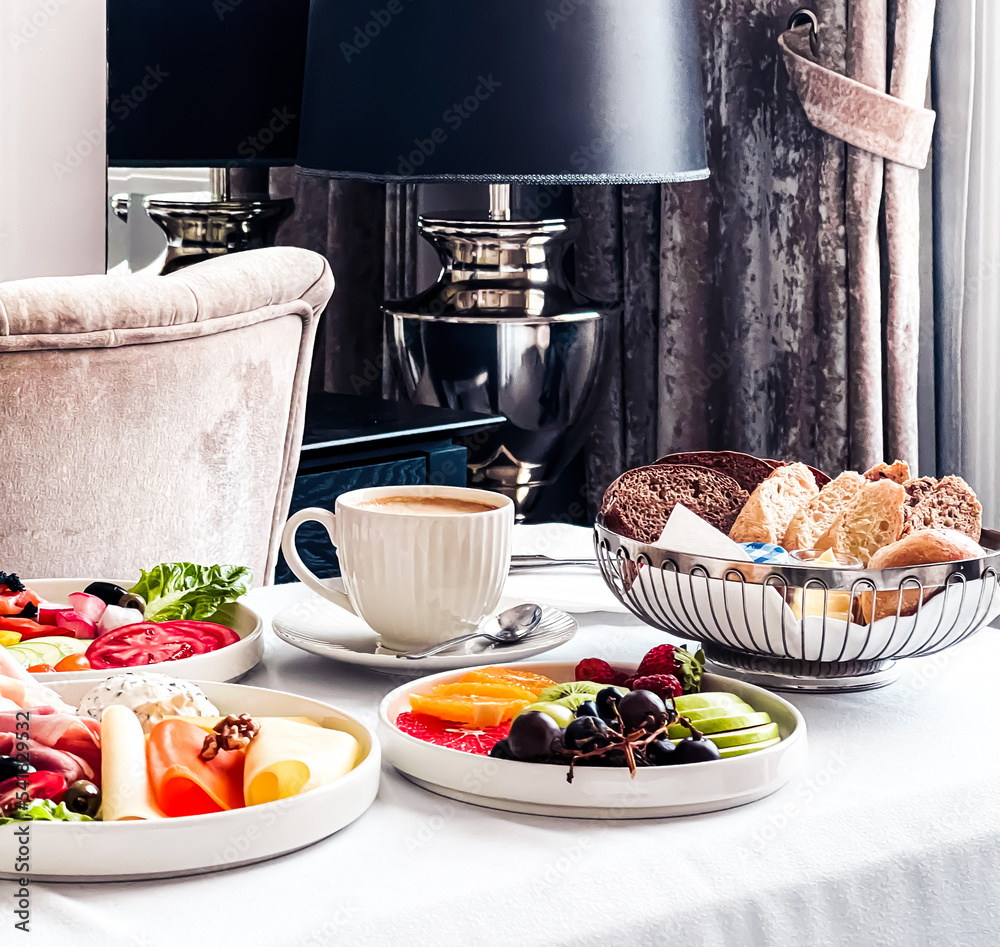 Luxury hotel and five star room service, various food platters, bread ...
