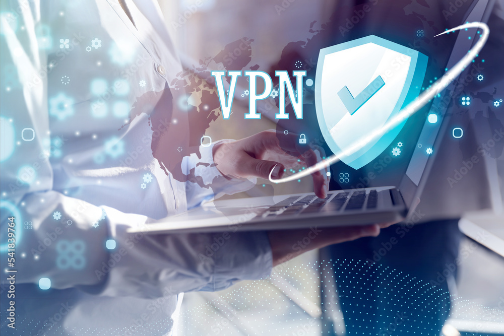 Woman using modern laptop with switched on VPN in office, closeup Stock ...