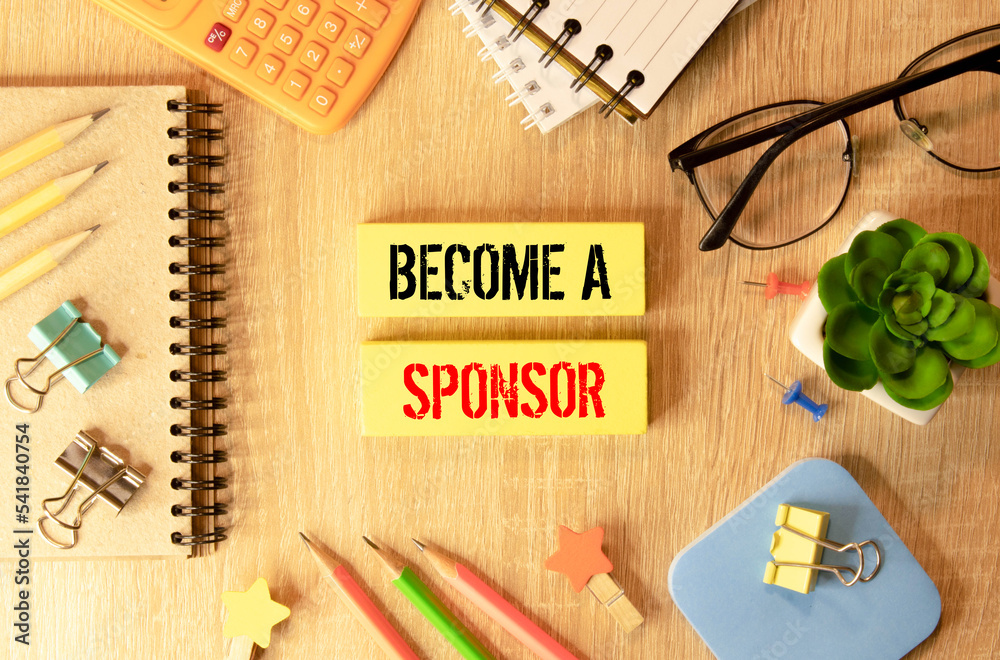 BECOME A SPONSOR word made from square letter tiles on turquoise ...