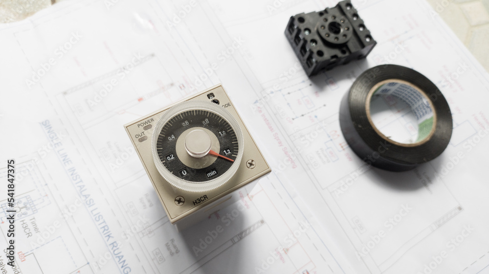 The close up Electric timer with electric diagram background. Stock ...