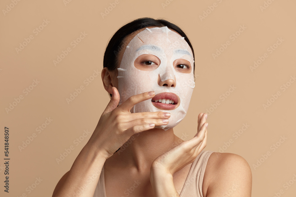 Woman Face Mask. Portrait Of Beautiful Girl Applying Cosmetic White ...