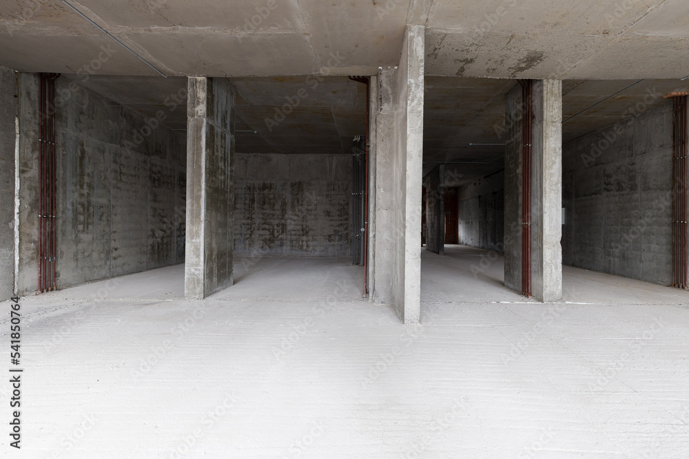 Empty concrete commercial space without finishing with partitions Stock ...