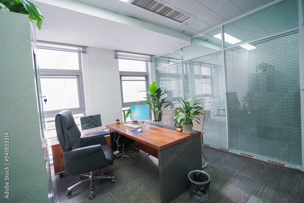 business office interior. table and armchair in the chief's office ...