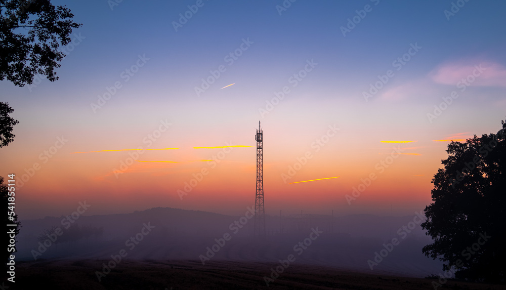 relay Cell tower in the early morning against the background of an ...