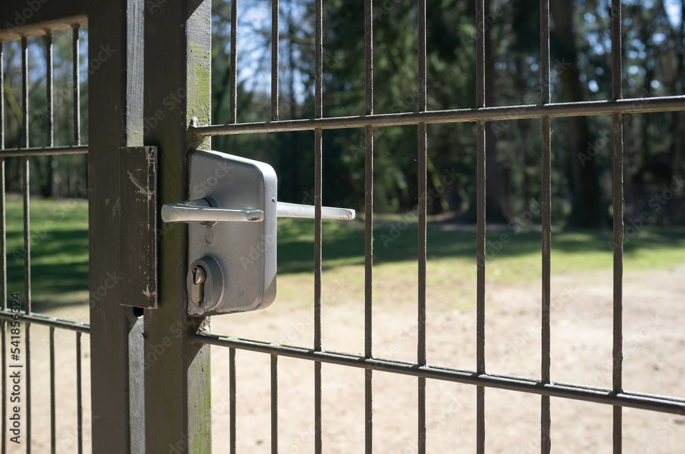 Closed gate, made of steel grating with push handle and mortise lock ...