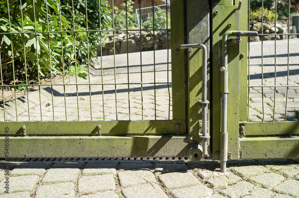 Gate made of steel grating, lockable at the bottom. No passage. Private ...