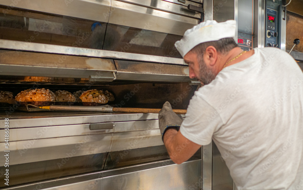 baker cooking panettone italian christmas cake baking at the ...