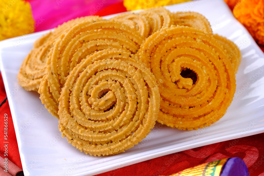 Indian Traditional Snack Chakli, a spiral shaped, Chakali or murukku ...